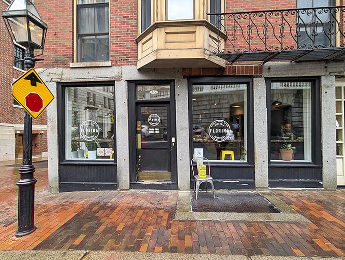 Brick sidewalks lead to pizza perfection. Florina's modest exterior hides the kind of thin-crust magic that pizza dreams are made of.