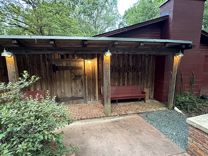Step through this weathered door and prepare for the aroma of sizzling steaks to make your stomach growl like a hungry bear.