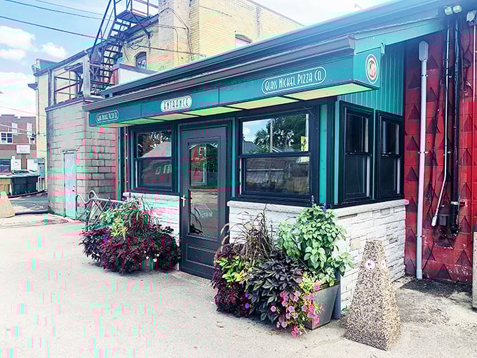 Summer flowers welcome pizza lovers to this Madison institution. No white tablecloths needed when the pies are this good! 