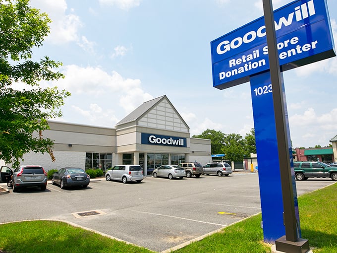 Goodwill's blue sign promises adventure for the thrifty explorer &ndash; like an archaeological dig where the artifacts are vintage Levi's.