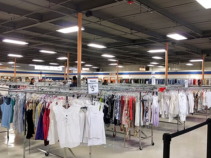 Endless racks of possibility! This Goodwill's clothing section stretches far and wide, a sea of second chances waiting to be discovered.