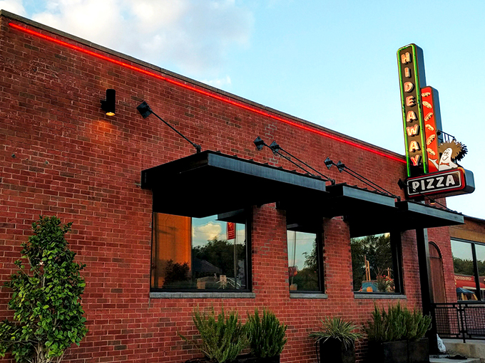 That classic red and green neon practically whispers, "Yes, this is the real deal." Hideaway's brick exterior has welcomed pizza lovers for generations.