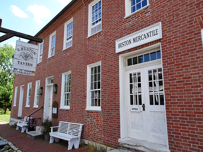 Step back in time at J. Huston Tavern, where that "Mercantile" sign promises old-fashioned hospitality alongside modern-day steak perfection.