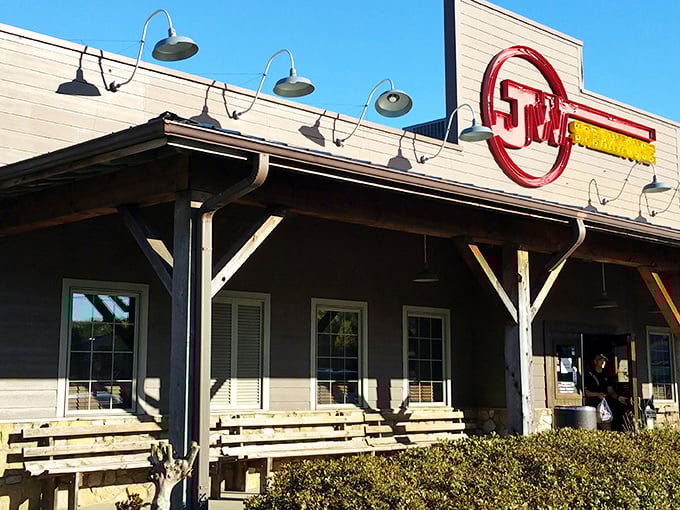 That glowing red sign isn't just decoration &ndash; it's a beacon calling all steak lovers home to flavor paradise.