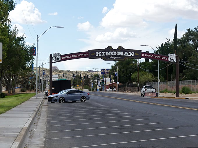 The historic Route 66 arch welcomes you to Kingman, where your Social Security check goes further than your childhood allowance ever did.