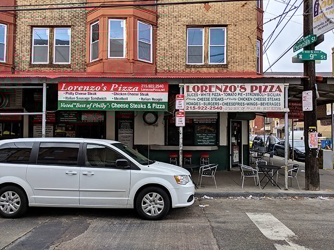 The classic corner pizzeria vibes hit different when you know generations have grabbed slices from this very spot.