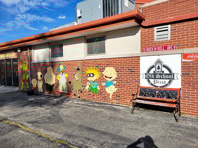 Rock & Roll Ave meets pizza paradise! The colorful cartoon characters outside hint at the playful vibe waiting inside.
