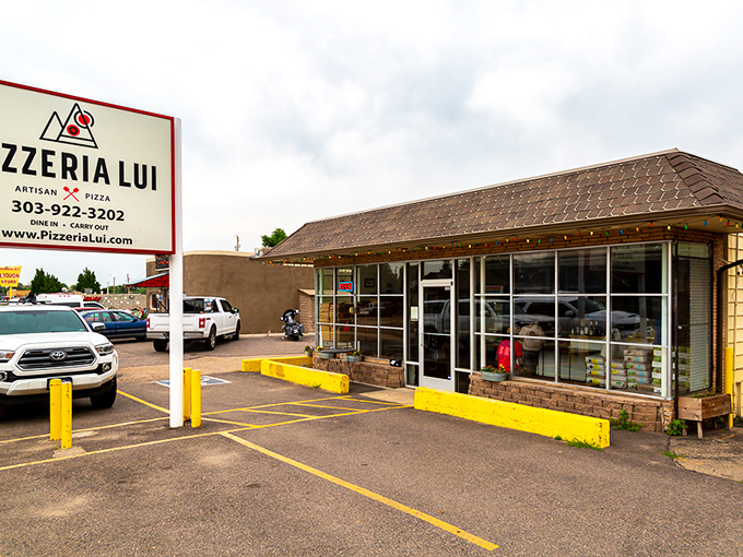 That yellow curb isn't just decorative&mdash;it's a runway light guiding you to wood-fired pizza paradise.