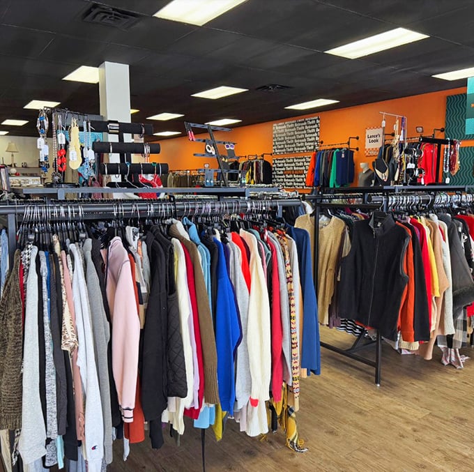 Racks of rainbow-hued clothing stretch into the distance—a thrifter's paradise with endless possibilities.