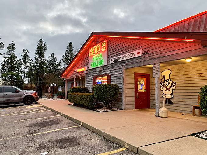 Sometimes the best treasures hide behind simple brick walls and weathered signs that whisper "pizza paradise inside." 