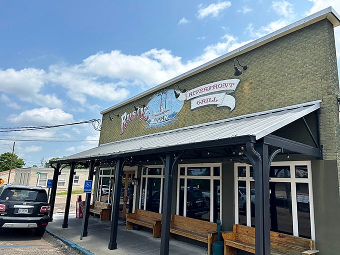 Sunshine bathes the welcoming facade of Rusty's, where locals gather for steaks that would make even vegetarians reconsider their life choices.