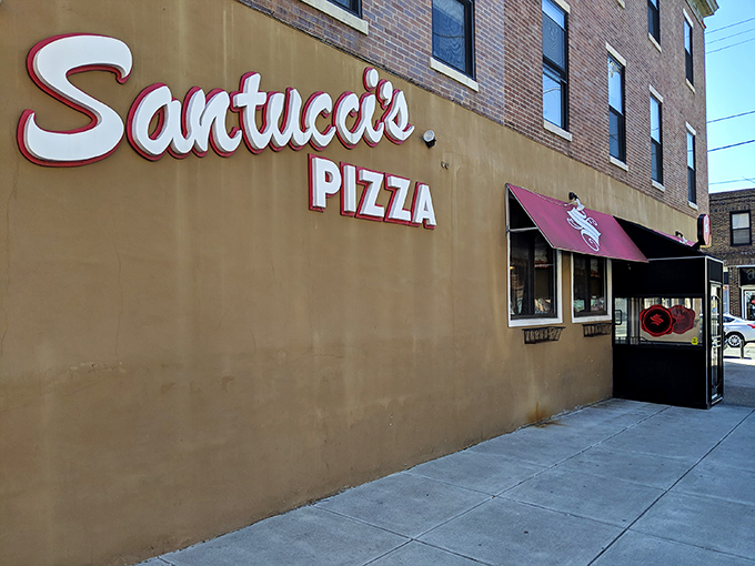 Santucci's bold signage promises what locals already know &ndash; square pizza perfection that breaks all the rules in the best way possible.