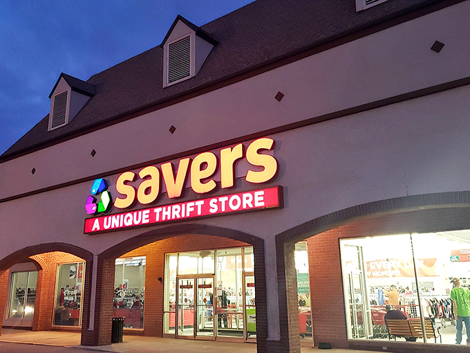 Savers after dark: The neon sign glows like a beacon, calling all night owls to hunt for midnight bargains.