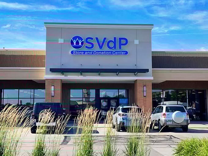 Nestled among prairie grasses, this St. Vincent de Paul location stands ready for your thrifting adventure. Wallet-friendly finds await!