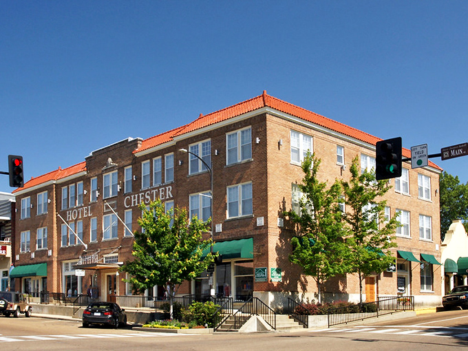 The historic Hotel Chester stands proudly in downtown Starkville, a brick sentinel watching over a community where affordability meets Southern hospitality.