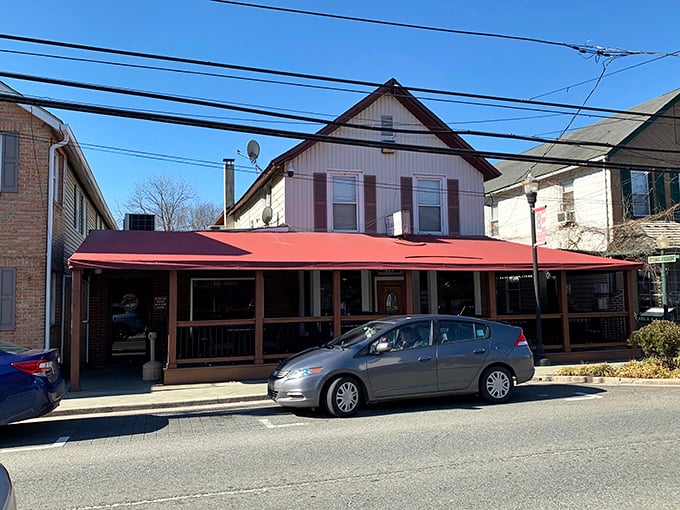 Small-town charm meets big-time flavor at Steak & Main. This cozy porch has witnessed countless "first bite" food moments.