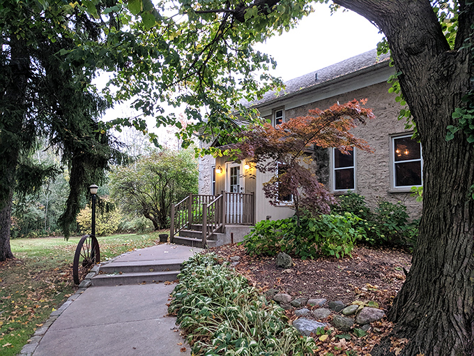 Autumn's embrace frames this historic hideaway where locals whisper about life-changing ribeyes.