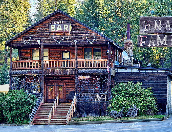 This weathered wooden fortress stands ready to serve carnivores seeking authentic western dining adventures.