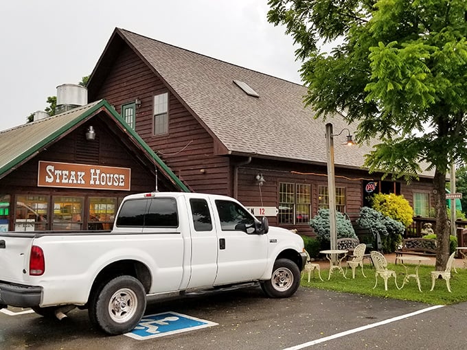 This wooden treasure might not look fancy, but that "STEAK HOUSE" sign promises exactly what you're craving &ndash; no frills, just flavor.