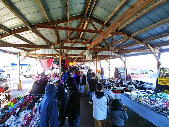 Under this rustic roof, shoppers navigate a maze of possibilities. Every table holds someone's future conversation piece!