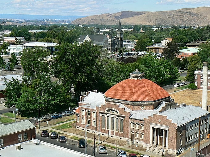 Yakima's cityscape blends the old and new. Church spires and historic brick buildings tell stories of the town's rich agricultural heritage.