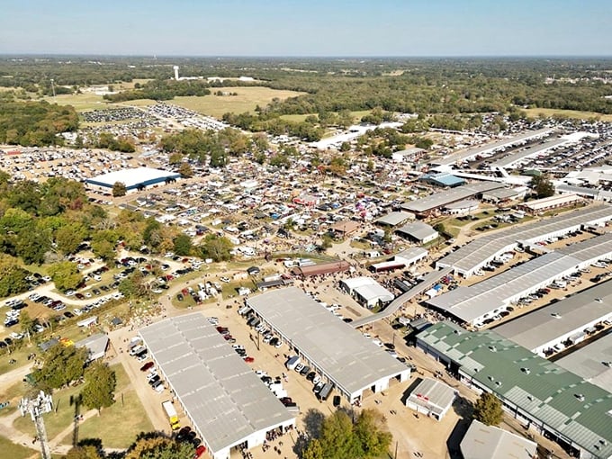 The aerial view that makes first-timers gasp. Like a small city that appears monthly, this 450-acre wonderland makes mall parking lots look like postage stamps.