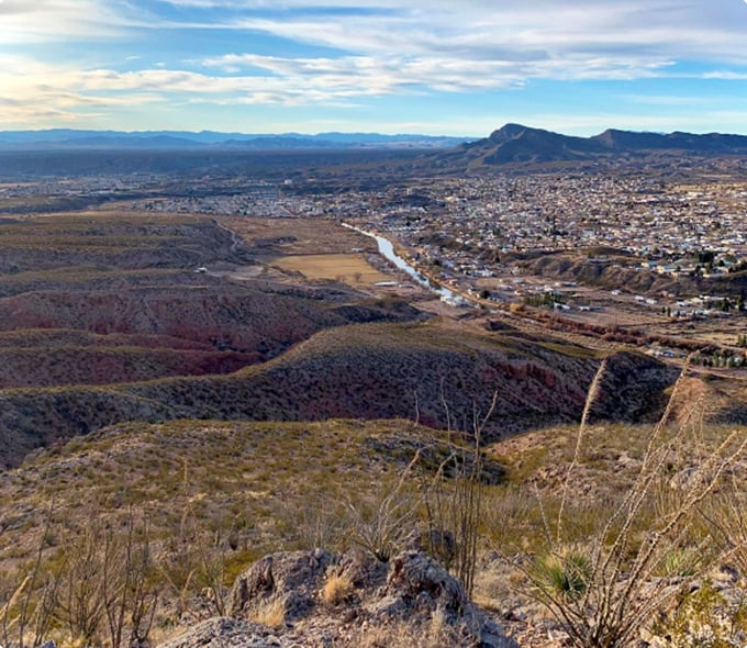 From this breathtaking vantage point, Truth or Consequences unfolds like a watercolor painting, with the Rio Grande cutting a silver path through the desert landscape.