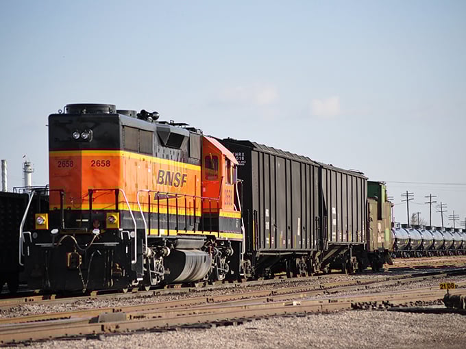 The bright orange BNSF locomotives are a colorful reminder of Ponca City's railroad heritage, still chugging through town with impressive regularity.