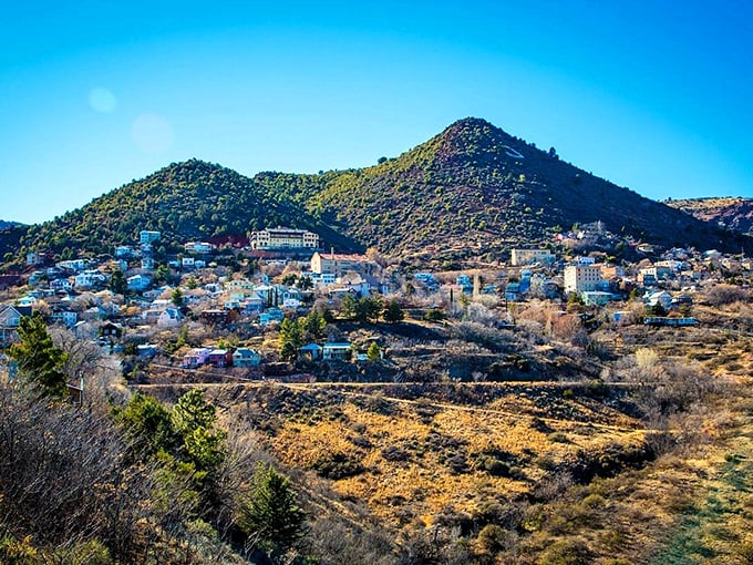 Cottonwood nestles perfectly against the mountains, its buildings dotting the landscape like colorful puzzle pieces beneath Arizona's impossibly blue sky.