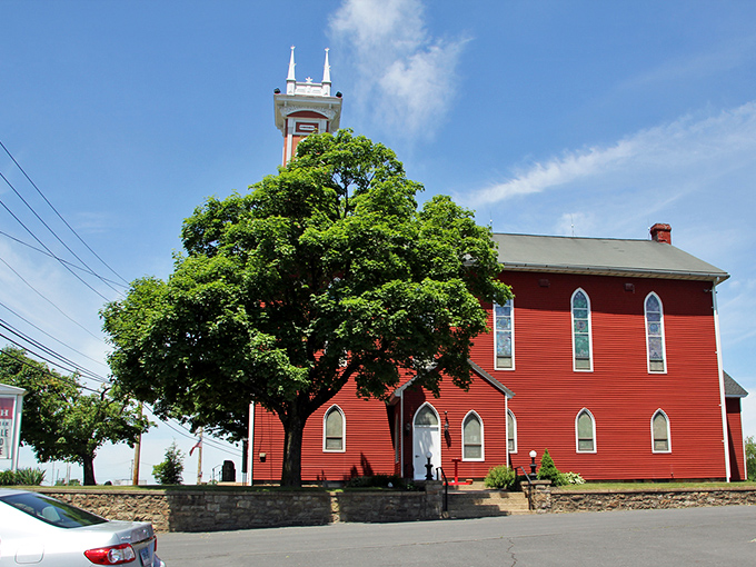 This vibrant red church isn't just a spiritual landmark—it's a testament to Orwigsburg's preserved heritage and community values that anchor the town.