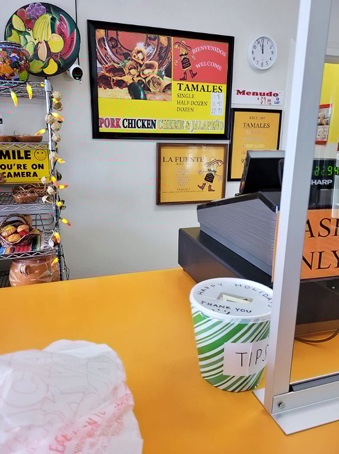 The counter where dreams come true. That tip jar has funded countless food pilgrimages&mdash;each dollar a thank you note for tamale perfection.