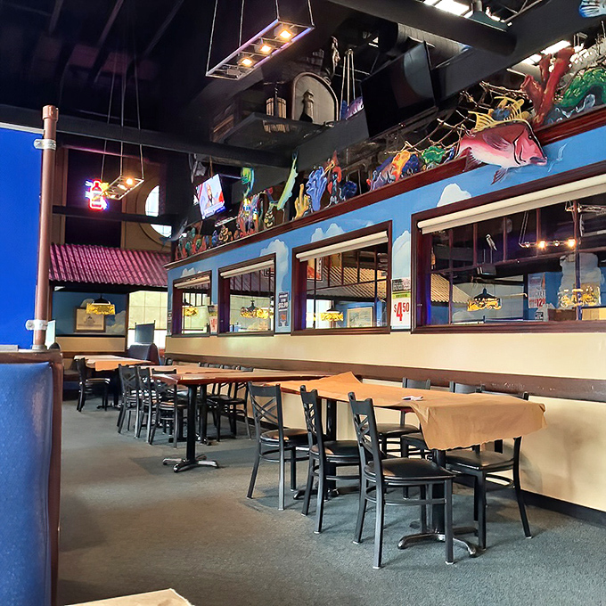 The dining area feels like stepping into a captain's quarters where the treasures aren't gold doubloons but perfectly prepared seafood platters.