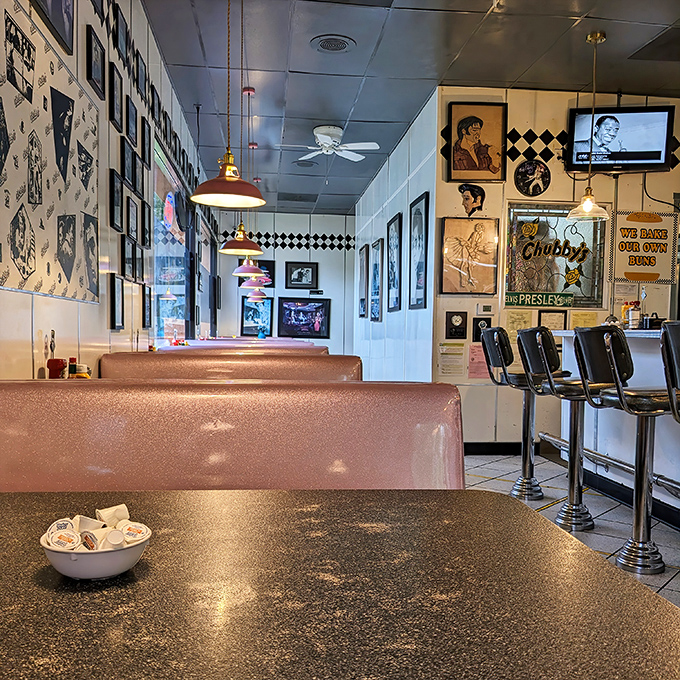 Step inside and time travel becomes real. Pink vinyl booths, Elvis on the walls, and the promise of comfort food make resistance futile.