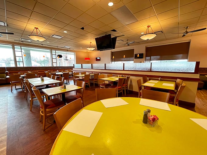 Simple wooden tables and cheerful yellow surfaces create the perfect canvas for culinary masterpieces. No Instagram filters needed&mdash;just honest food.