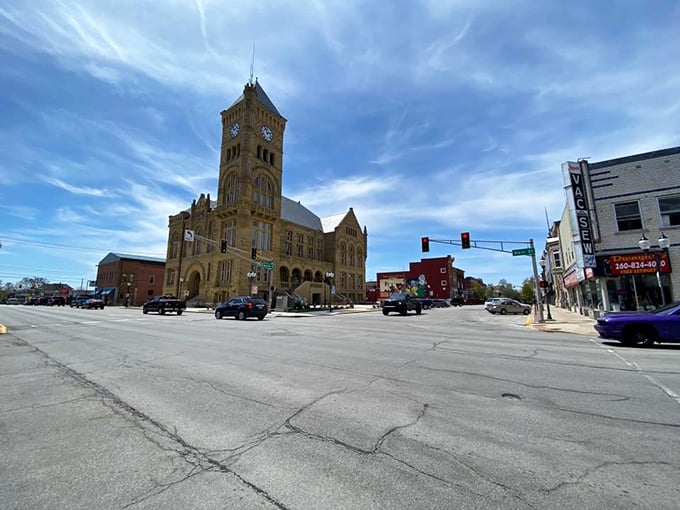 The Wells County Courthouse commands downtown Bluffton like a limestone monarch, its clock tower keeping watch over generations of Hoosier comings and goings.