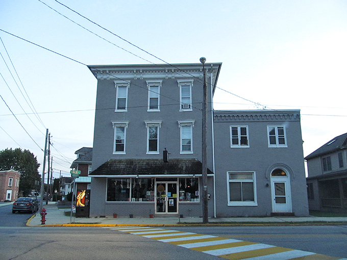 This stately gray building has witnessed centuries of Hummelstown history, standing dignified against the changing seasons while housing modern businesses within its historic walls.