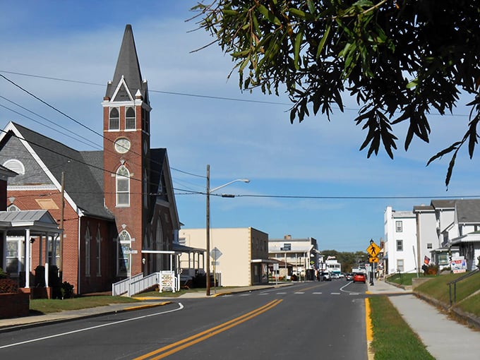 Downtown Harrington's historic church steeple stands as both spiritual beacon and unofficial town timekeeper, reminding residents that here, time moves at a gentler pace.