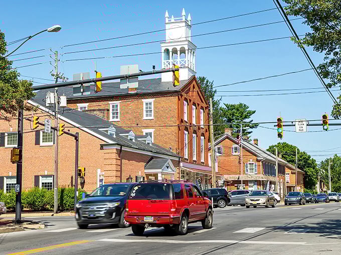 The iconic white clock tower rises above Strasburg's historic buildings like the town's unofficial timekeeper, reminding everyone that here, rushing is strictly optional.