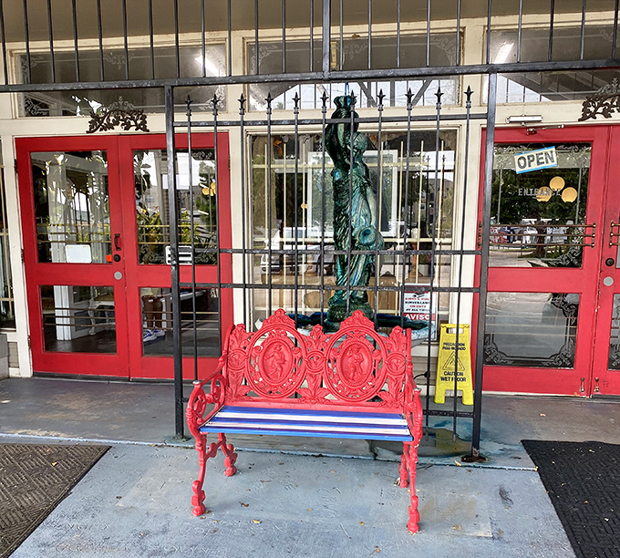 That red bench isn't just seating &ndash; it's your first clue that this place understands the perfect marriage between preservation and personality. Lady Liberty approves!