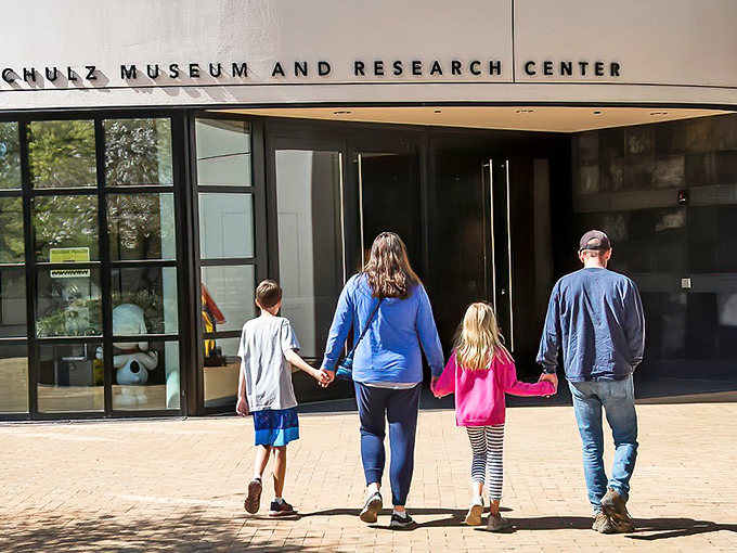 Families approach the museum entrance with that unmistakable anticipation that comes when childhood memories are about to collide with adult appreciation.