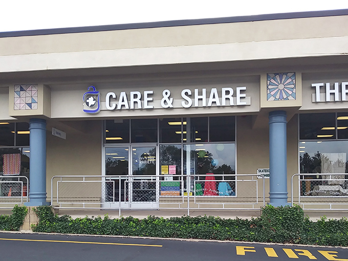 Not your grandmother's thrift store entrance. Care & Share's professional storefront promises an organized treasure hunt rather than a chaotic rummage sale.