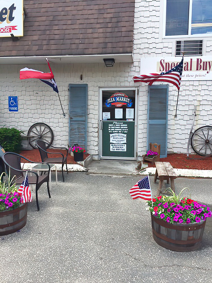 The unassuming entrance belies what awaits inside&mdash;flower barrels, wagon wheels, and flags offering a warm Massachusetts welcome.