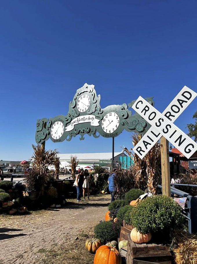Time stands still under this whimsical clock installation, where the railroad crossing sign perfectly captures Junkstock's intersection of past and present.