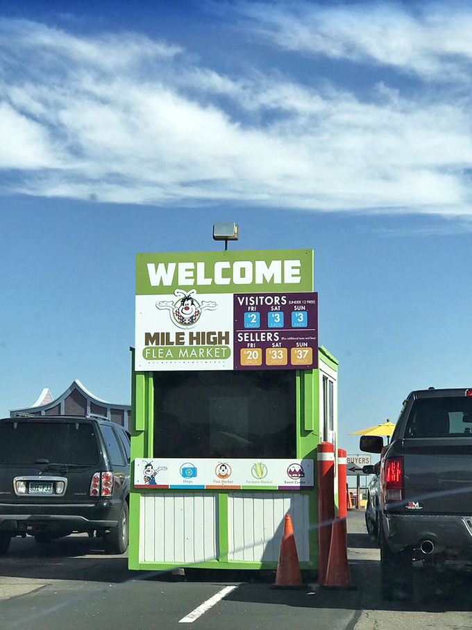 The gateway to bargain heaven. This cheerful green entrance booth welcomes weekend warriors with modest admission fees&mdash;your ticket to a world of haggling and hidden gems.