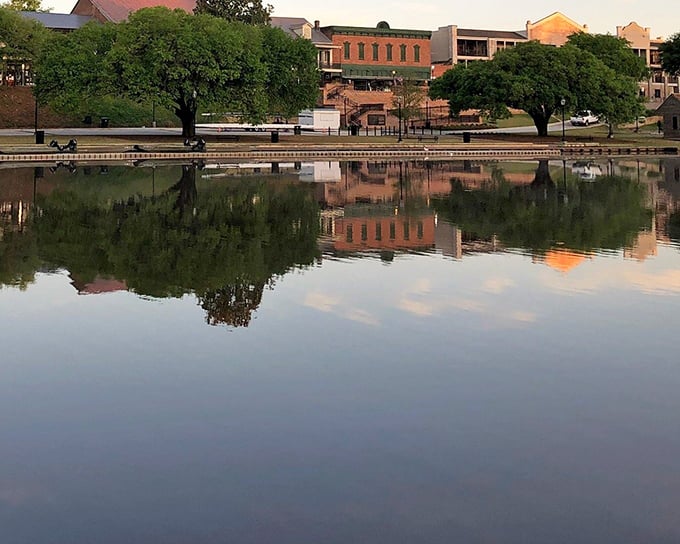 Mirror, mirror on the water&mdash;Cane River Lake creates perfect reflections of Natchitoches' historic buildings, doubling the town's charm with every glance.