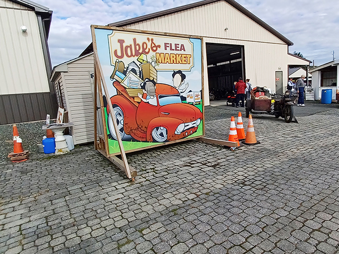This whimsical sign perfectly captures the spirit of Jake's &ndash; a cartoon character zooming off with more treasures than his vintage convertible can reasonably hold.