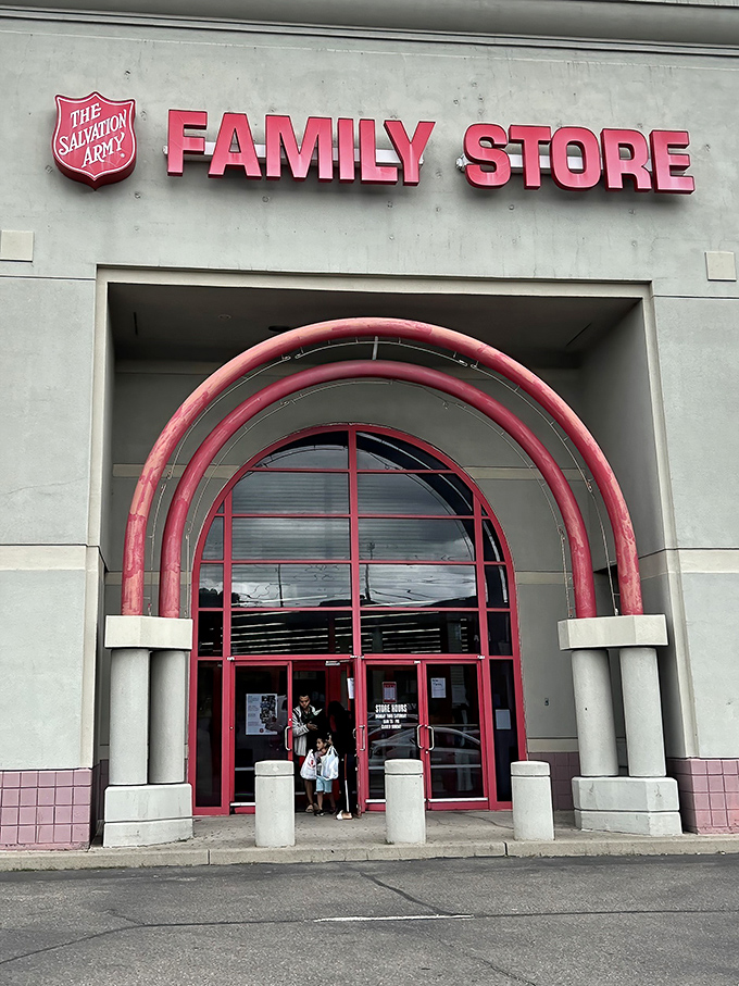 Step through these distinctive red-framed doors and prepare for an adventure. The unassuming exterior hides a warehouse of wonders waiting to be explored.