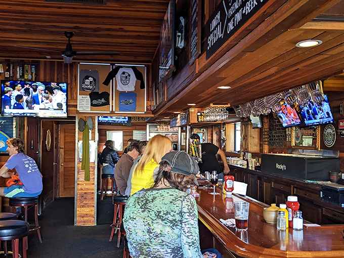 Inside Rocky's, warm wood paneling and a well-worn bar create the perfect backdrop for burger bliss. No pretension here&mdash;just good vibes and better food.