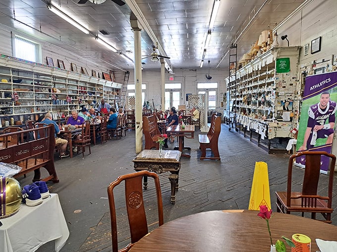 Church pew-style seating and walls lined with memorabilia create a dining room that feels more like Sunday dinner at grandma's than a restaurant.