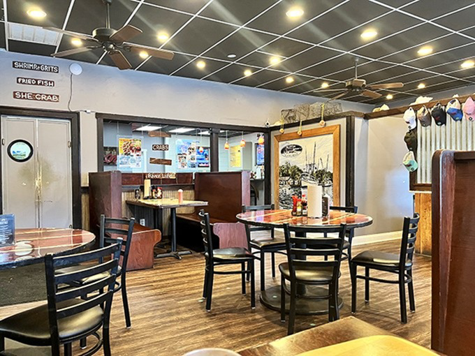 Inside, nautical simplicity meets dining comfort. Those directional signs aren't just decor—they're your roadmap to seafood nirvana.
